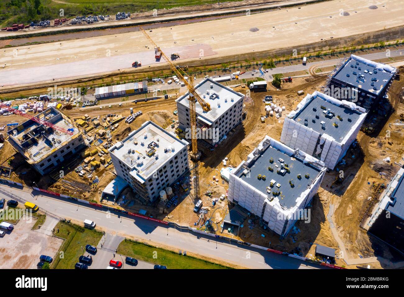Aerial Bird Eye View Of a Construction Site Building Cranes Looking ...