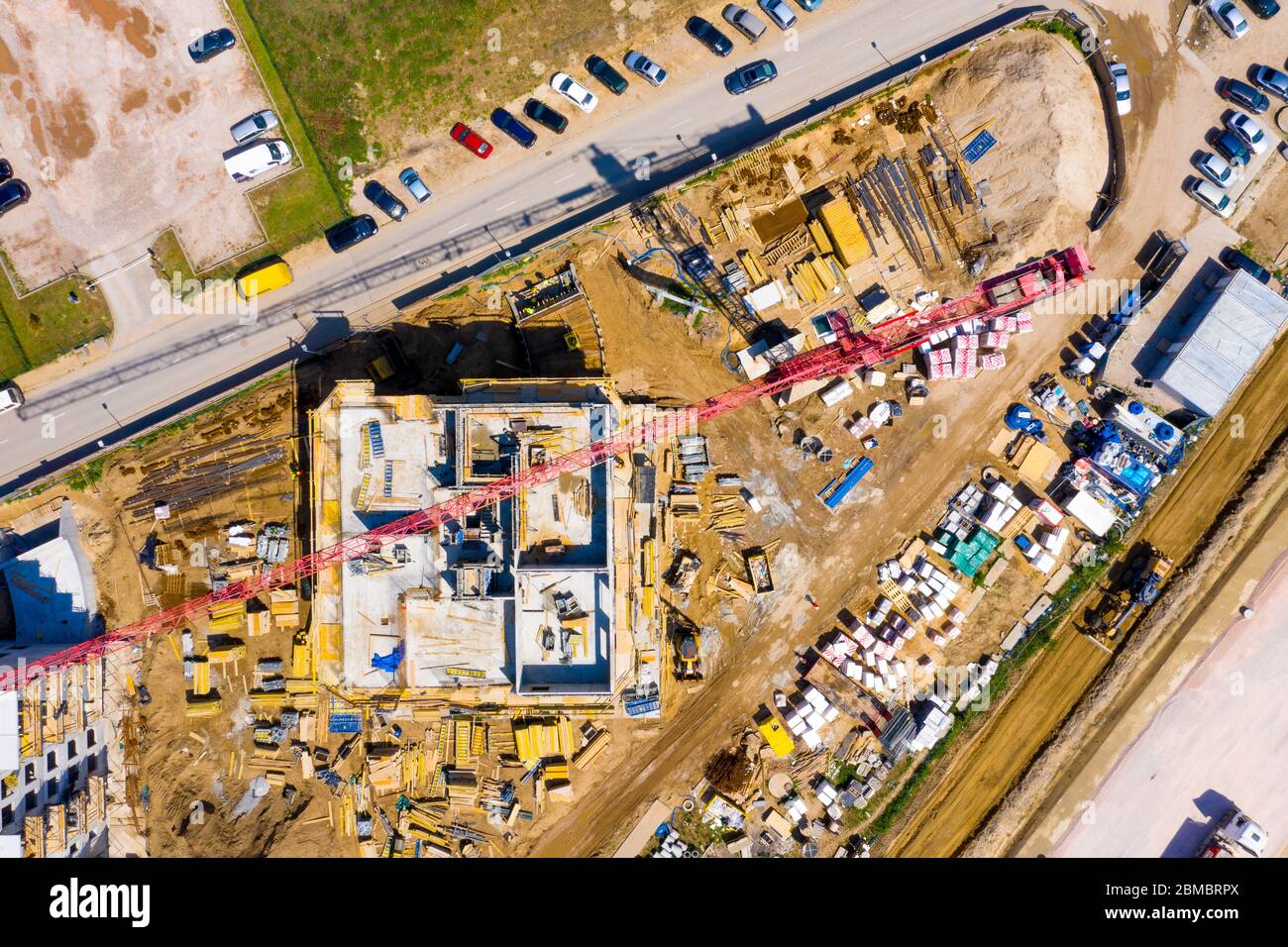 Construction site with cranes. Construction workers are building ...