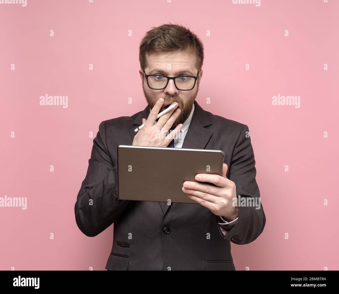 Shocked man suit hi-res stock photography and images - Alamy