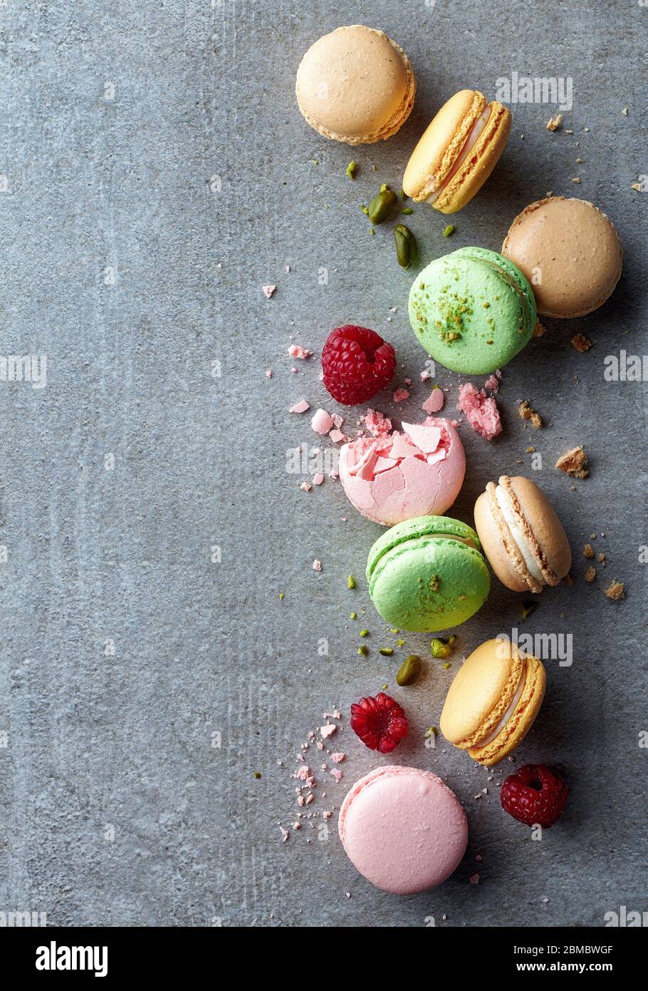 Colorful macarons on gray marble background. Top view. Pastel colors ...