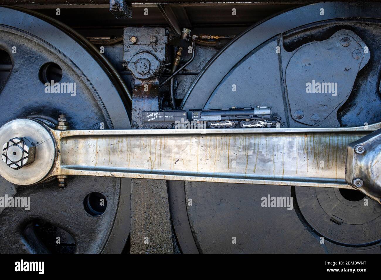 A model steam locomotive sits on a drive rod of the real engine Stock ...