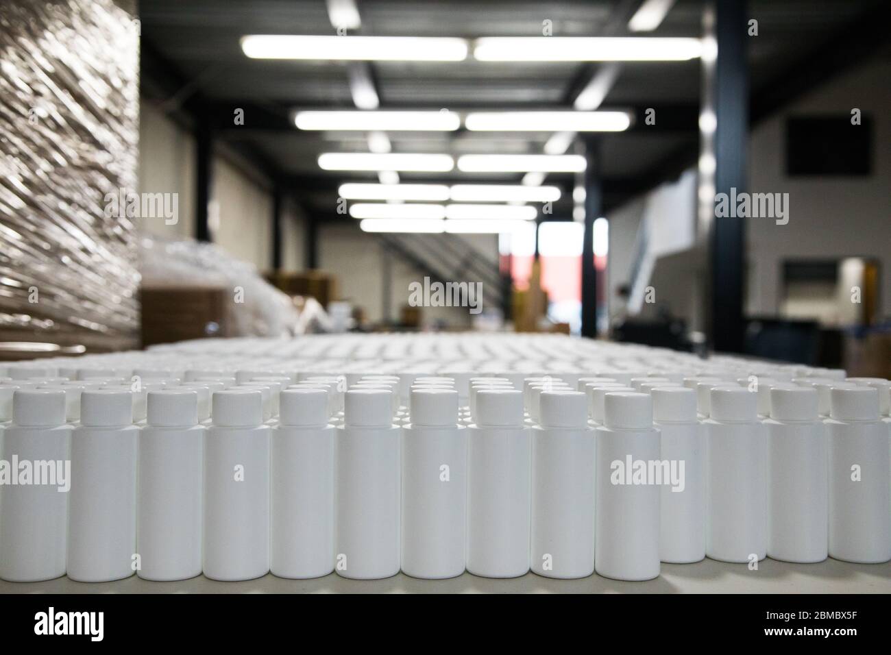 sanitizer bottle production line in factory Stock Photo - Alamy