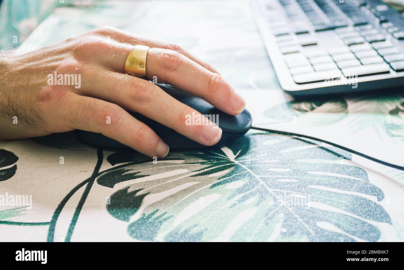 male hand handling a computer mouse Stock Photo - Alamy