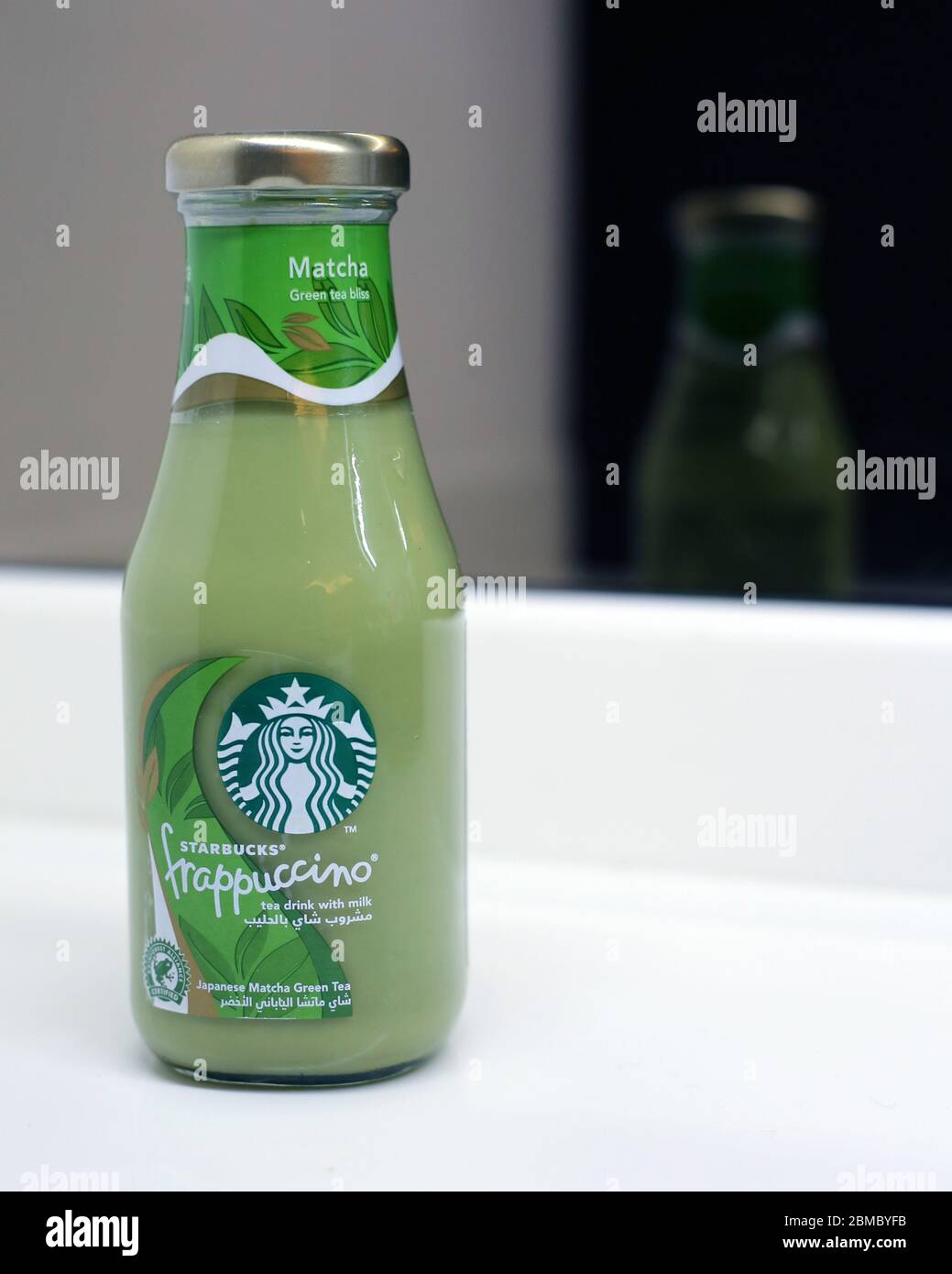 Bottle of Starbucks matcha frappuccino with a white background. Healthy ...