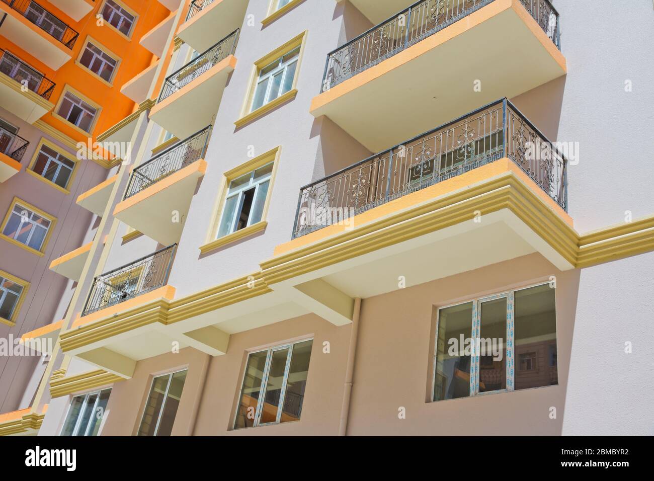 elegant decorative old stone balcony. low level perspective of multi ...