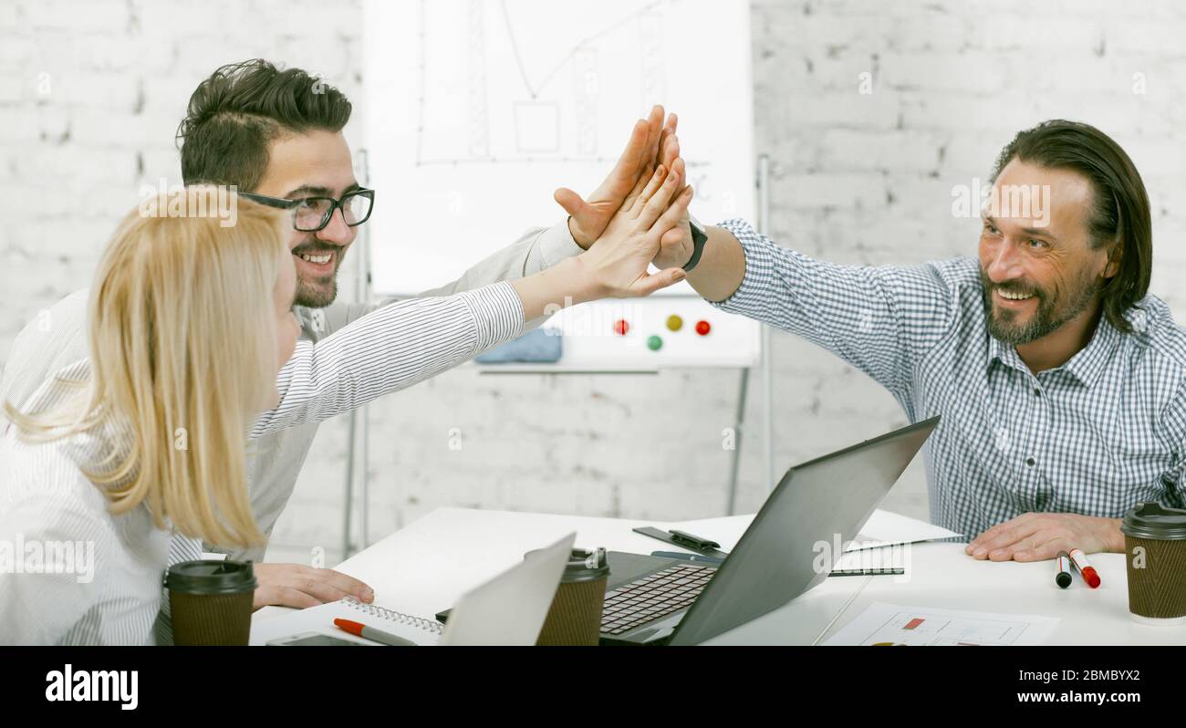 High five hands hi-res stock photography and images - Alamy