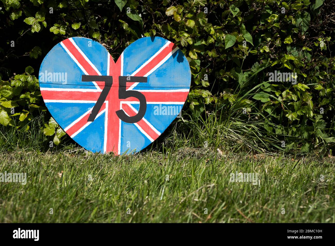 A Union Jack shaped heart VE Day display in Bugbrooke, Northamptonshire ...