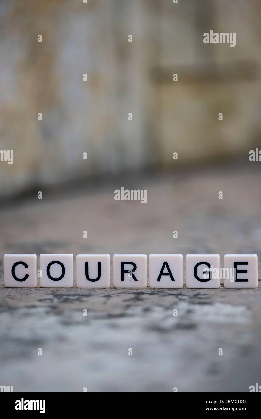 Courage in block letters Stock Photo - Alamy