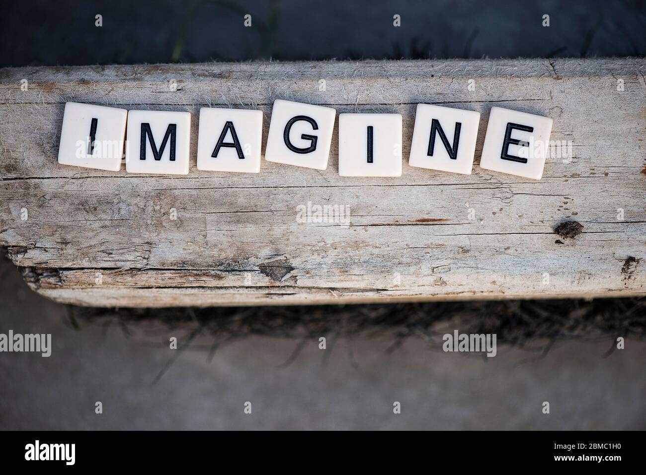 Imagine in block letters Stock Photo - Alamy