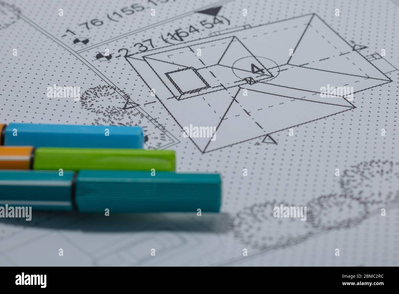 Three different colored pen on the architectural plan Stock Photo - Alamy
