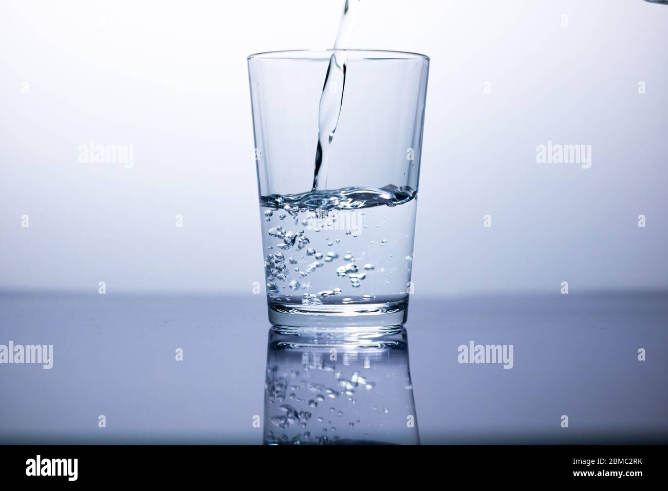 Filling a glass hi-res stock photography and images - Alamy