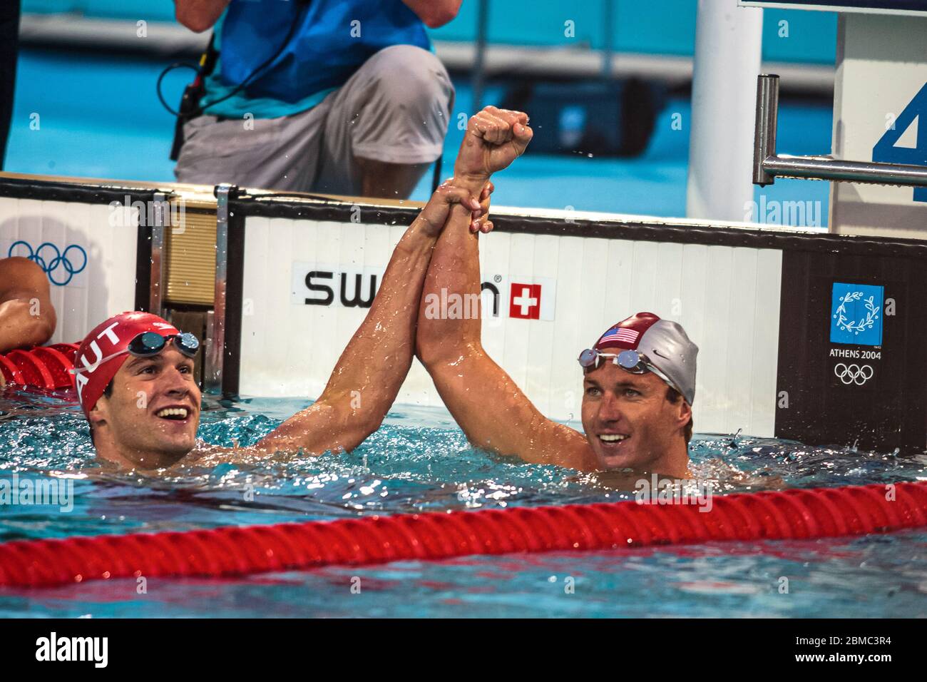 Aaron Peirsol (USA) wins the gold medal with silver medalist Markus ...