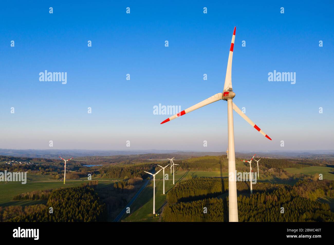 wind wheels on an evening Stock Photo - Alamy