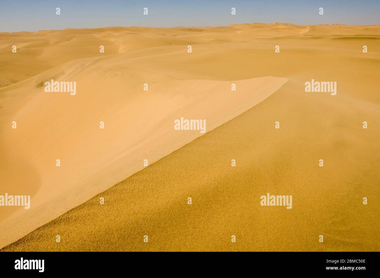 impressive sand dunes with waves and patterns Stock Photo - Alamy