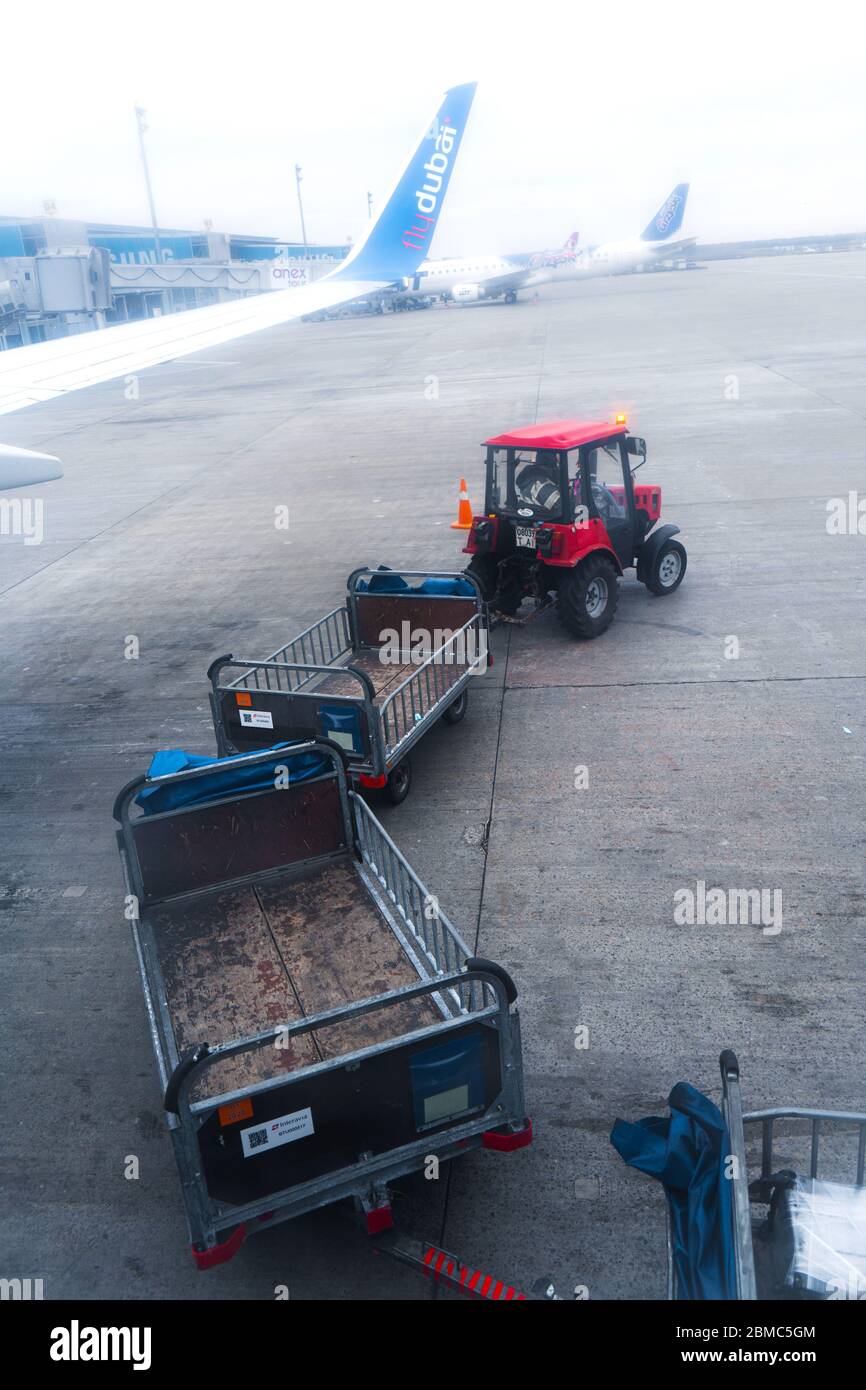 Tractor with luggage car hi-res stock photography and images - Alamy