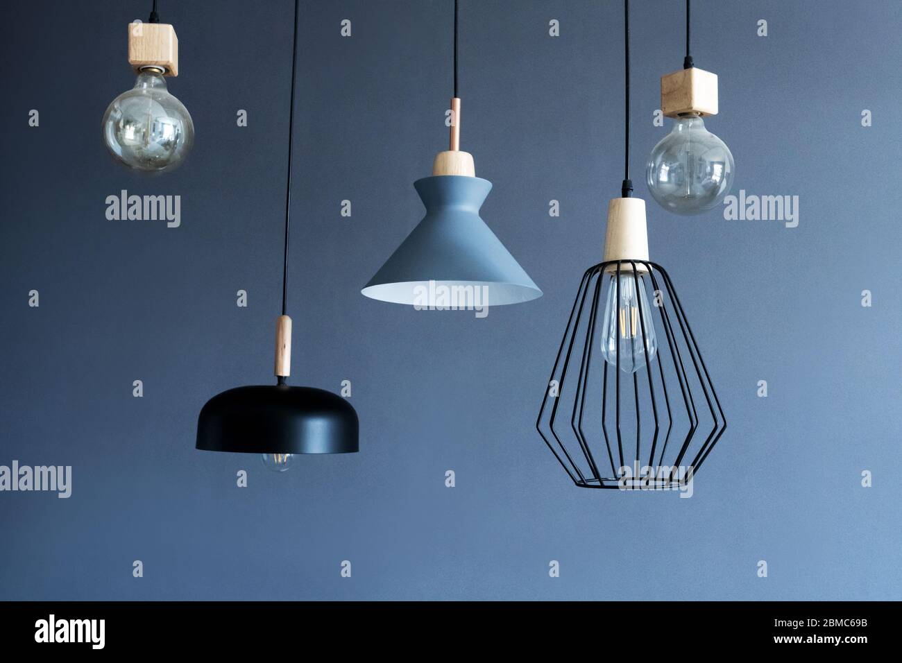 Interior decoration of stylish housing. Loft style incandescent lamp ...