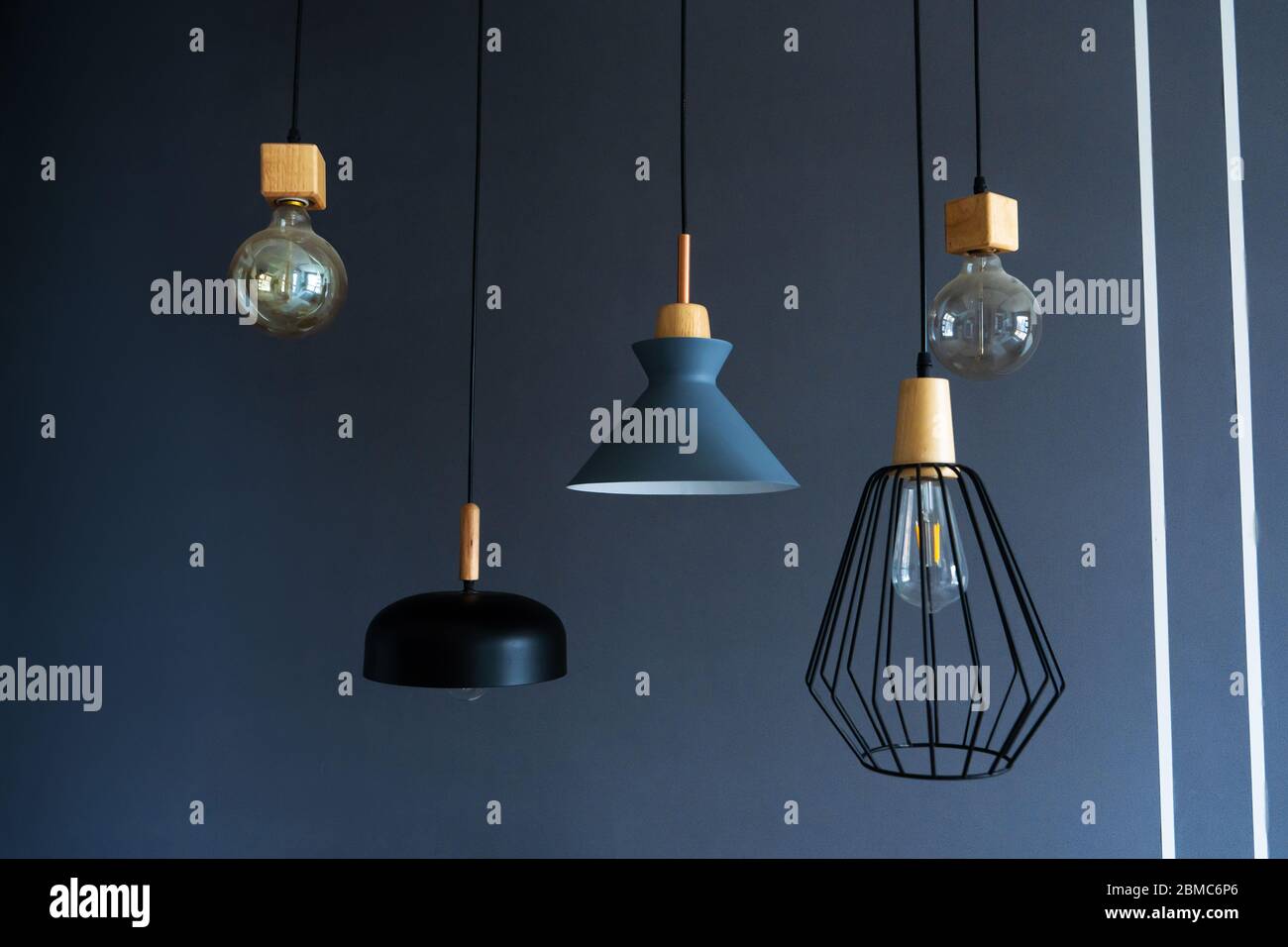Interior decoration of stylish housing. Loft style incandescent lamp ...
