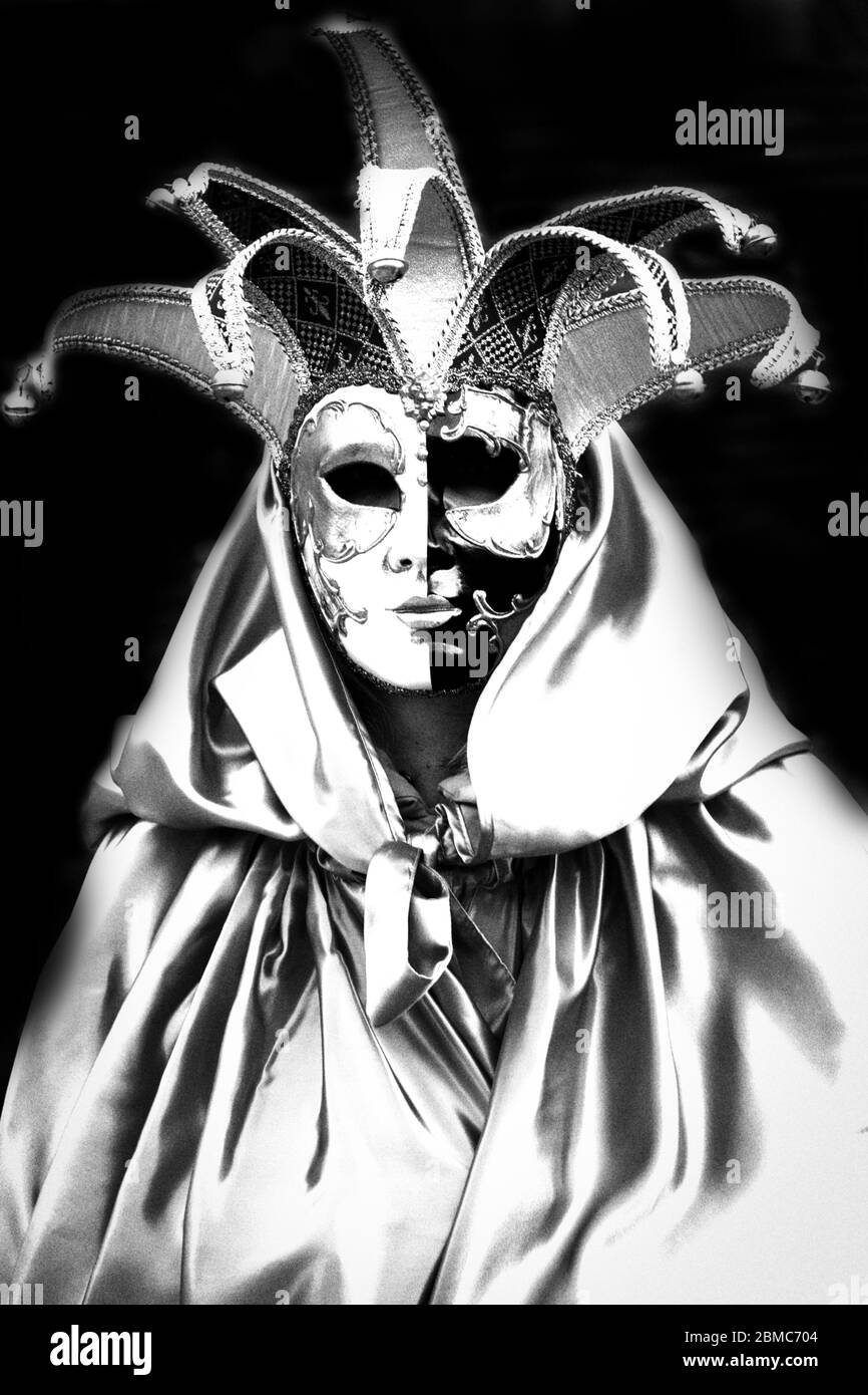 Costumed Reveler of the Carnival of Venice in pure silver Stock Photo ...