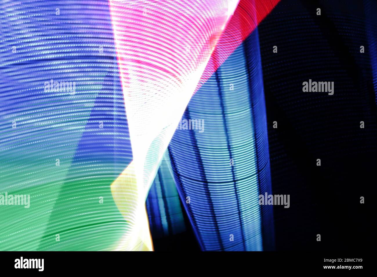 Bright color light on black background Stock Photo - Alamy