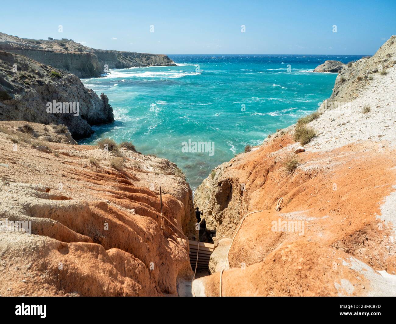 Ladder to climb down to Tsigrado Beach at Milos Island - Greece Stock ...