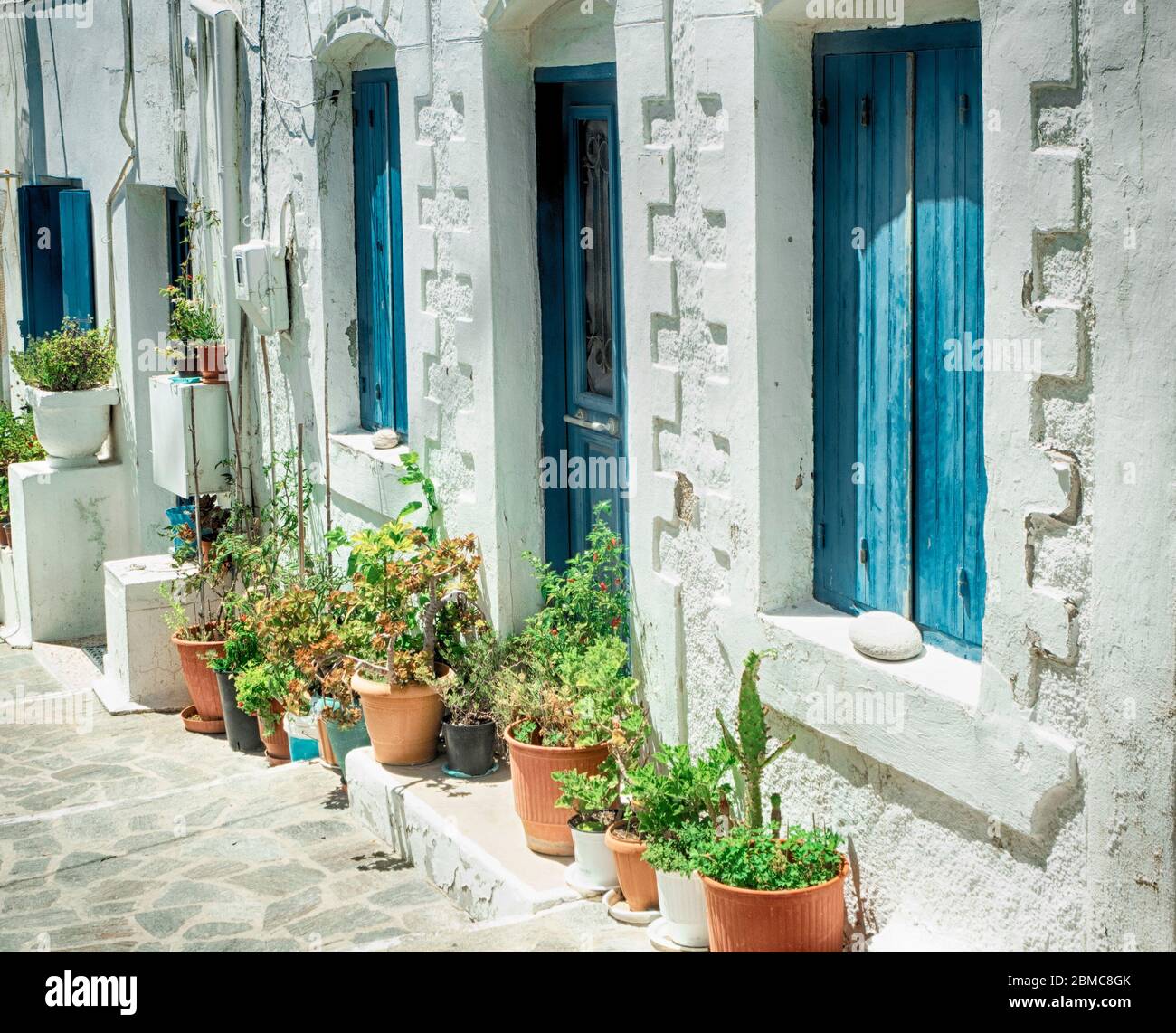 Classic Greek House Facade with blue door and windows - Milos Island ...