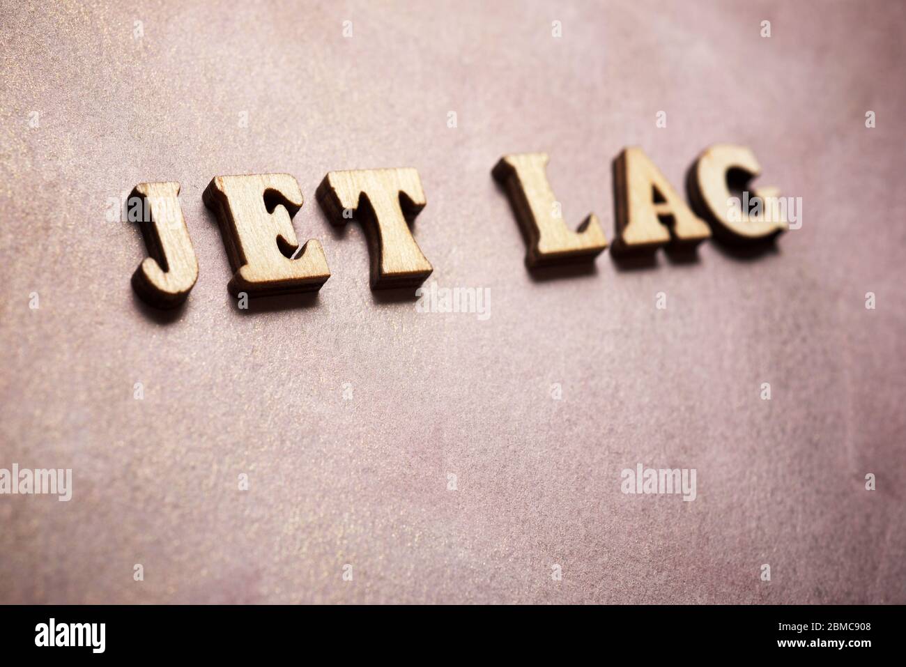 Jet Lag text on a colored paper Stock Photo - Alamy