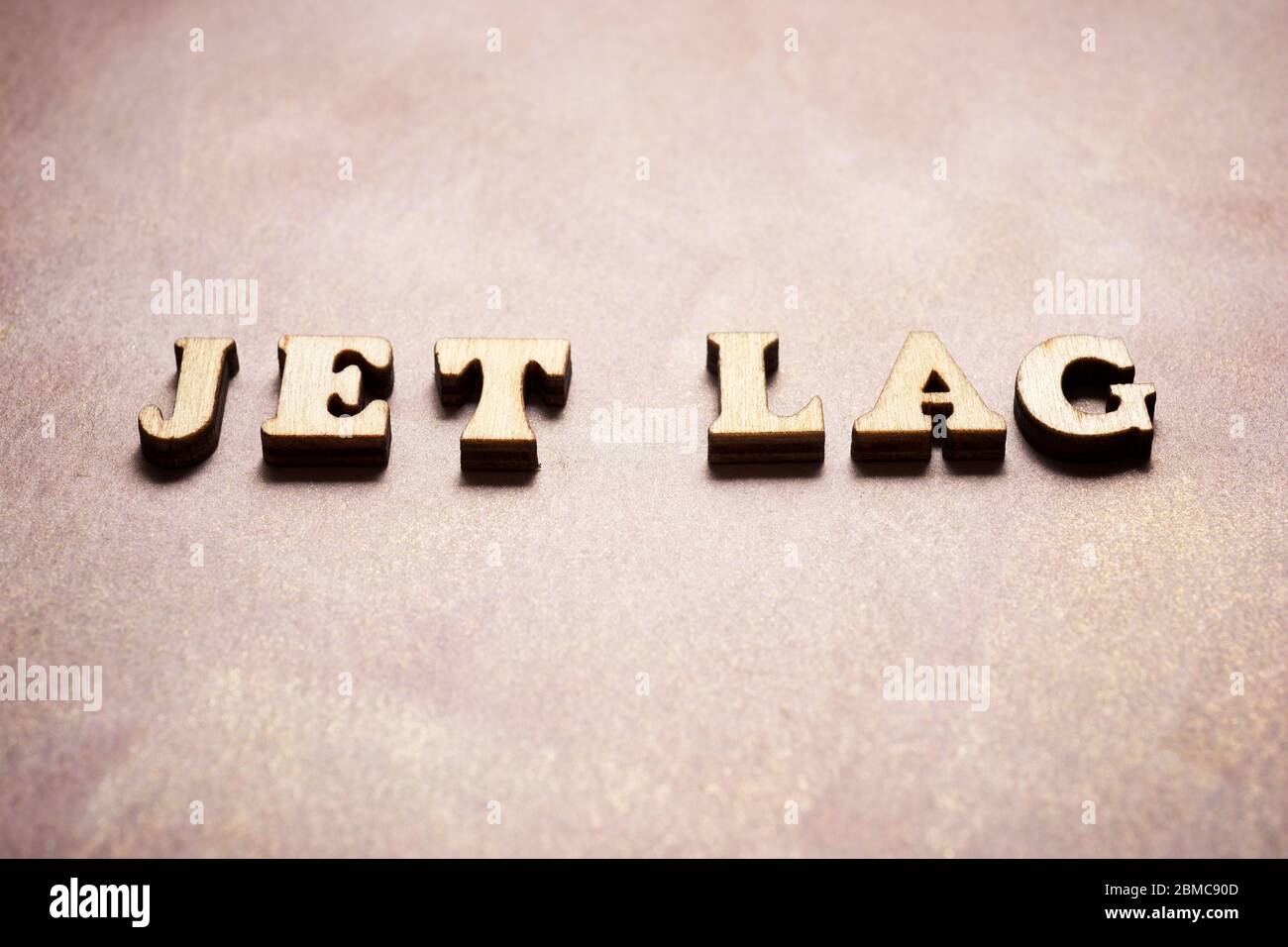 Jet Lag text on a colored paper Stock Photo - Alamy