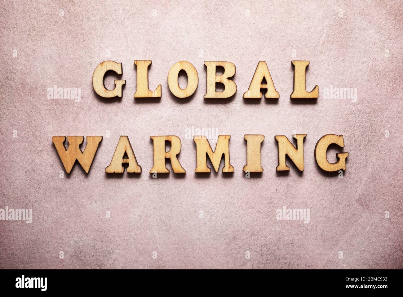 Global warming text on a colored paper Stock Photo - Alamy