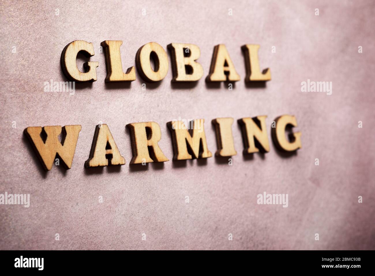 Global warming text on a colored paper Stock Photo - Alamy