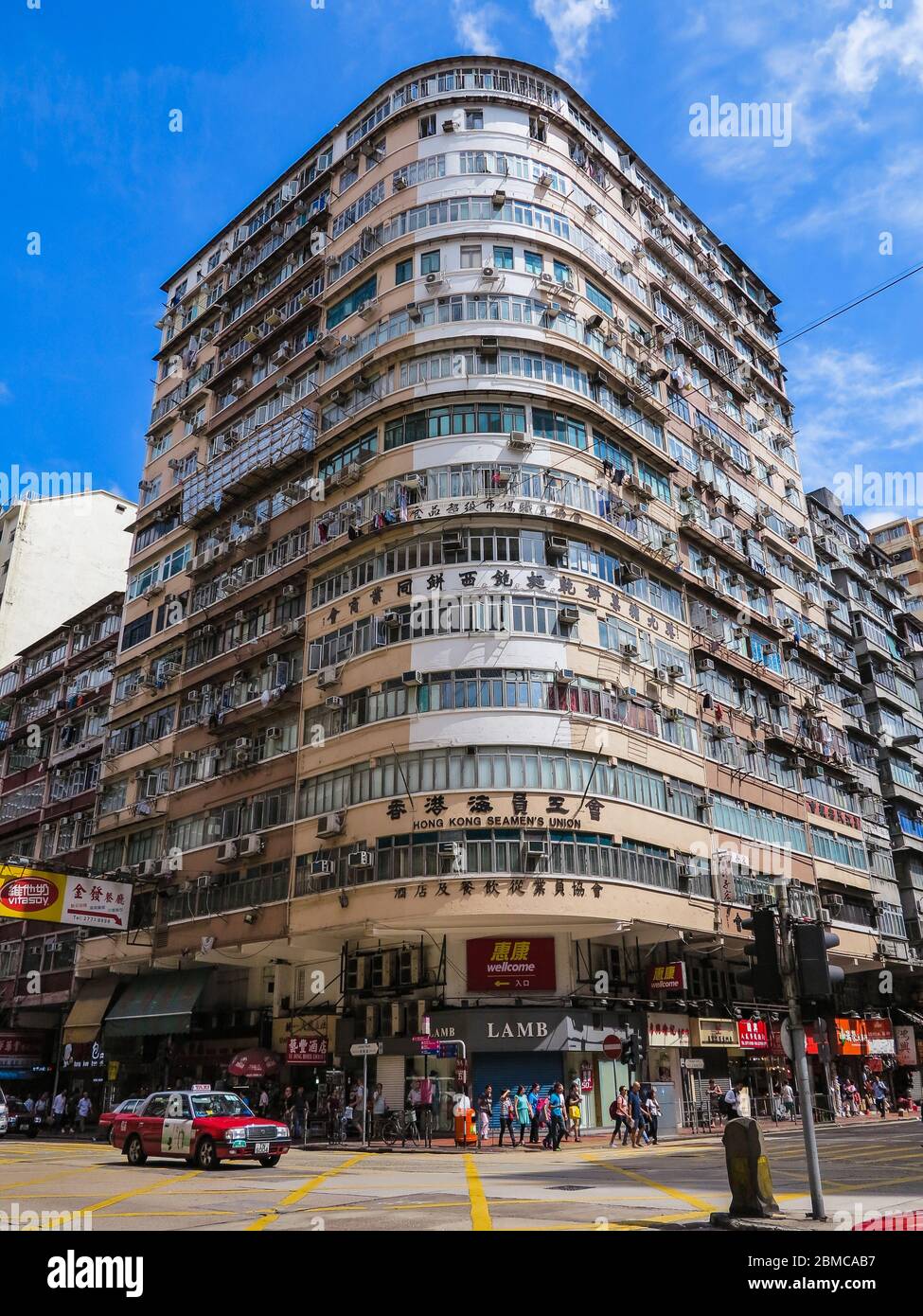 A tall building in the neighborhood of Kowloon in Hong Kong Stock Photo ...