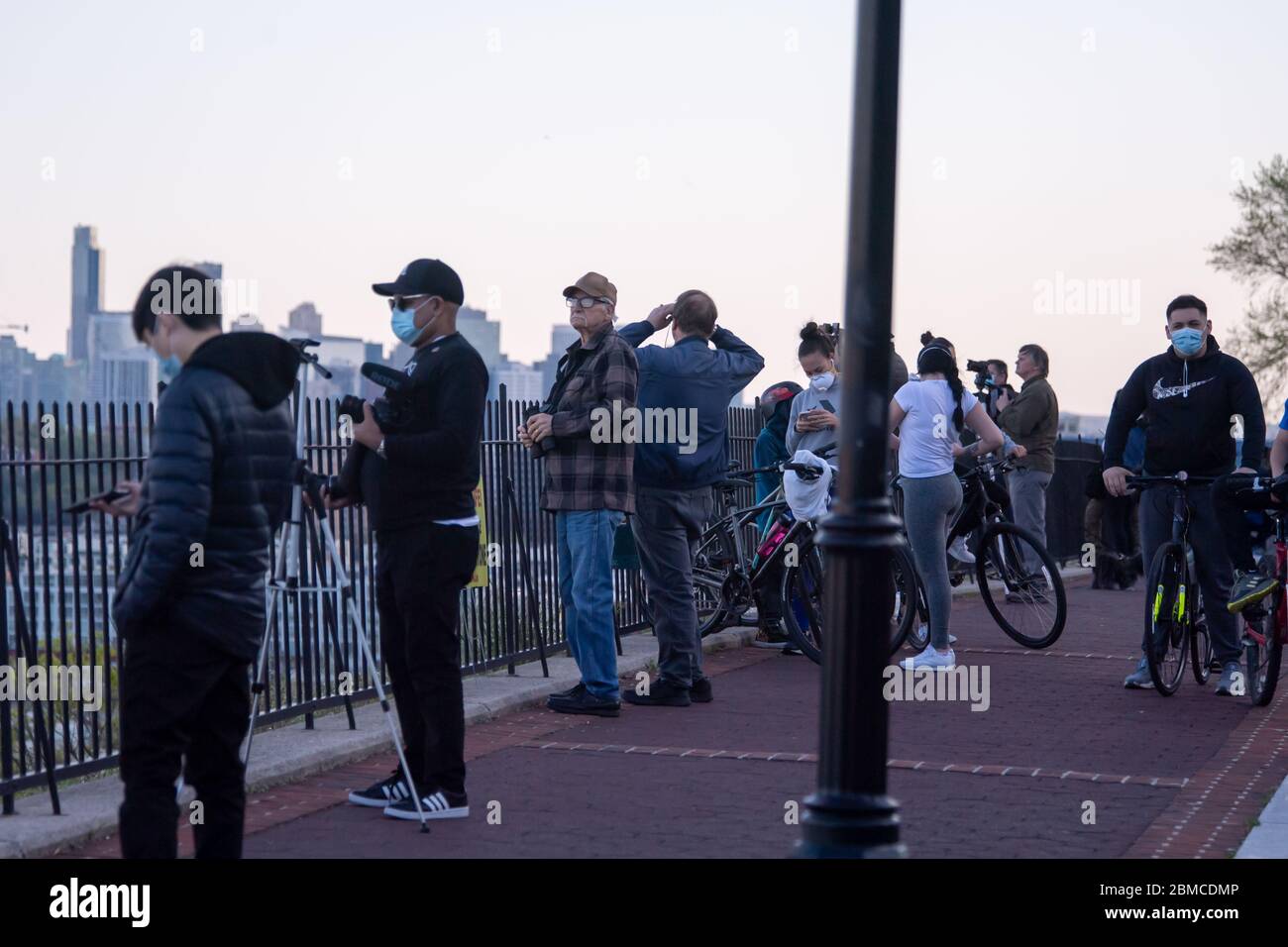 NEW YORK, NEW YORK - MAY 07, 2020: People watch as JetBlue honors ...
