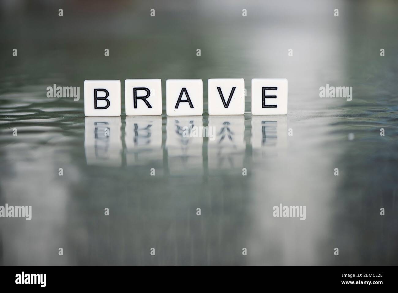 Brave in block letters Stock Photo - Alamy