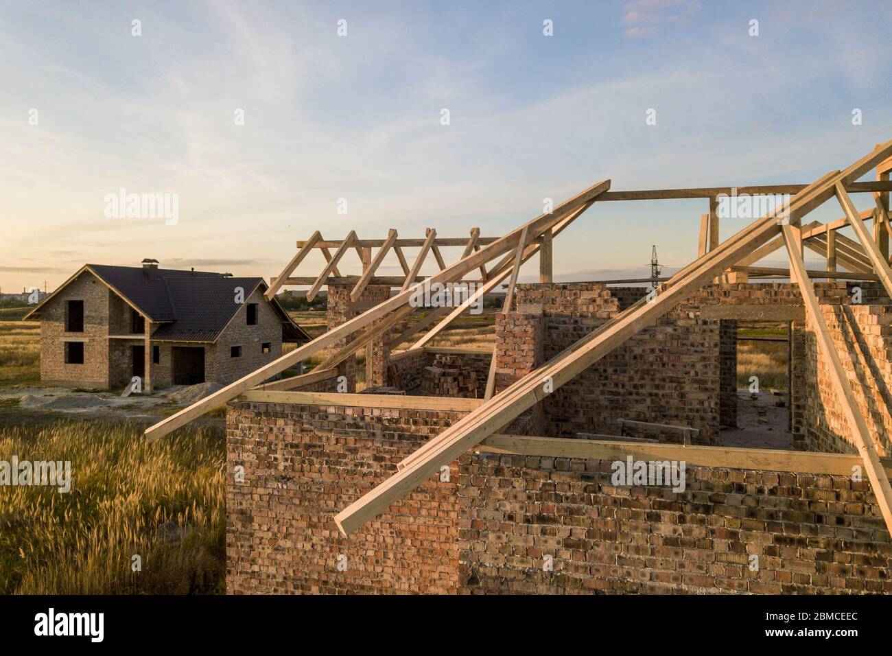 Private residential house with wooden roof frame structure under ...