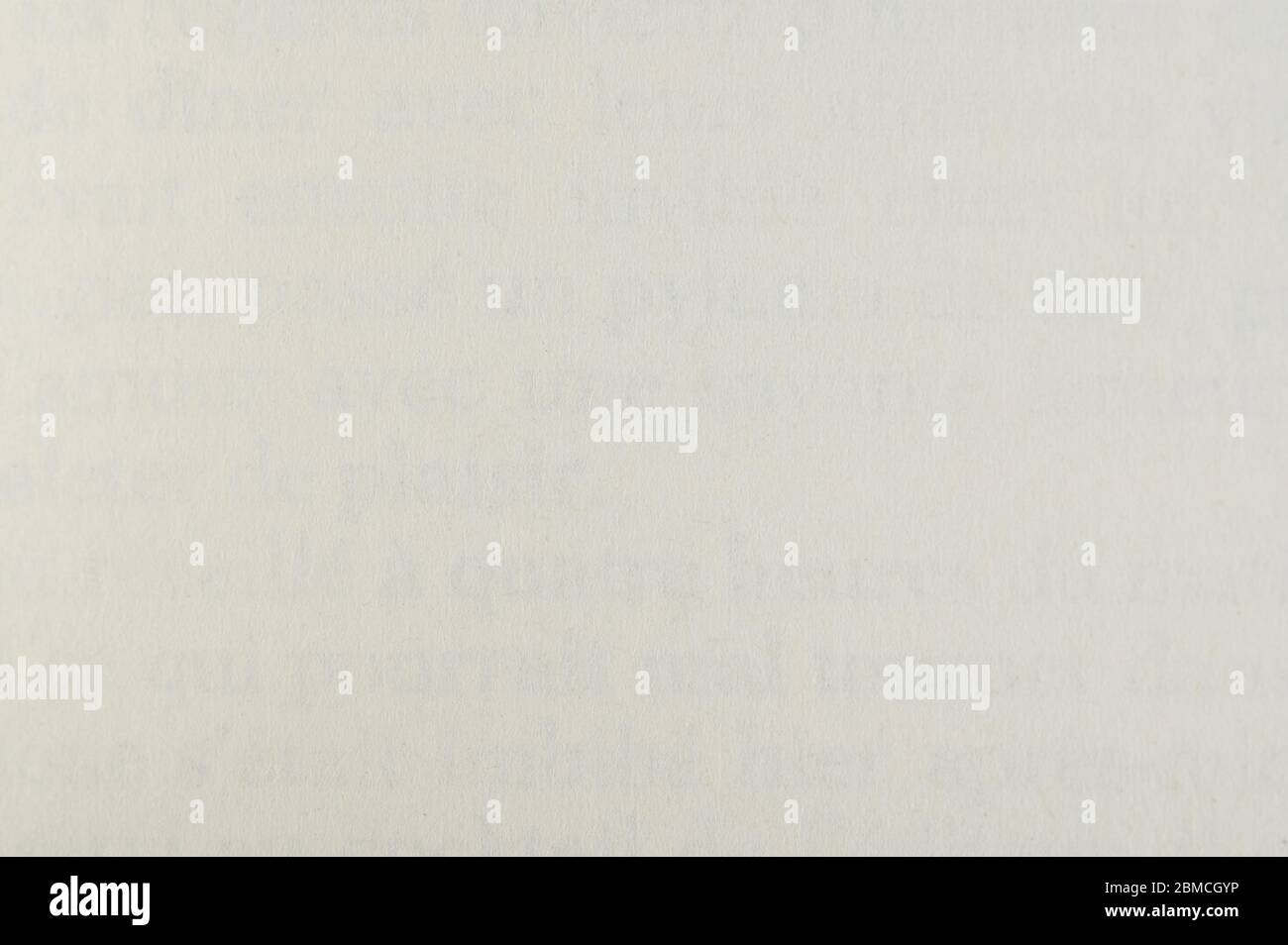 Book page with dim words on blank beige color paper Stock Photo - Alamy