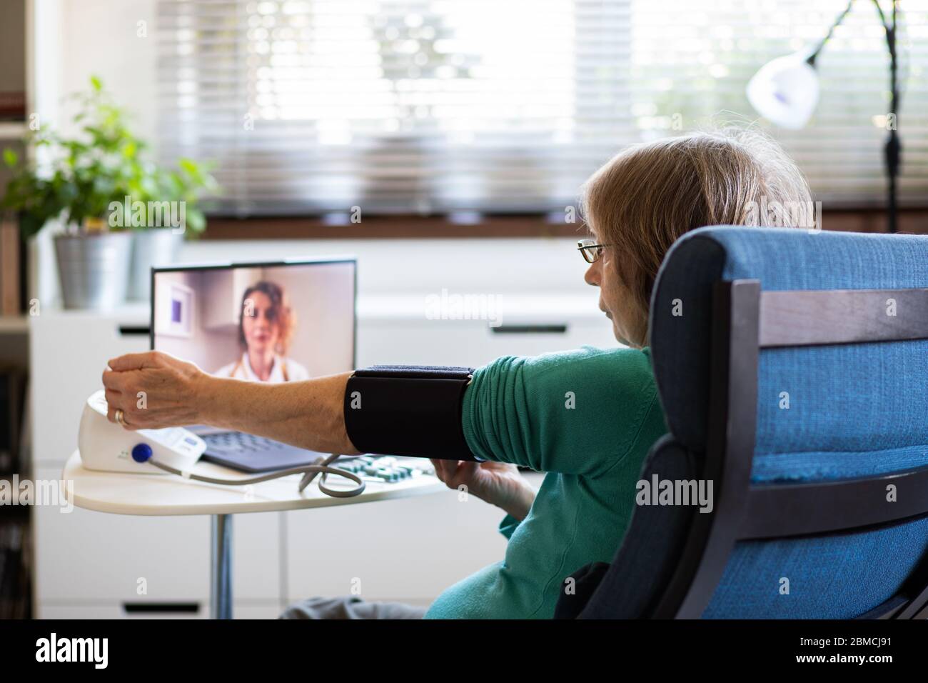 Home telehealth patient blood pressure hi-res stock photography and ...