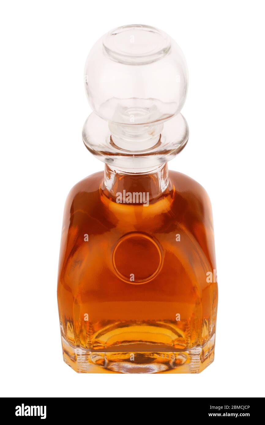 perspective top view closeup of liqueur or whisky glass bottle with ...