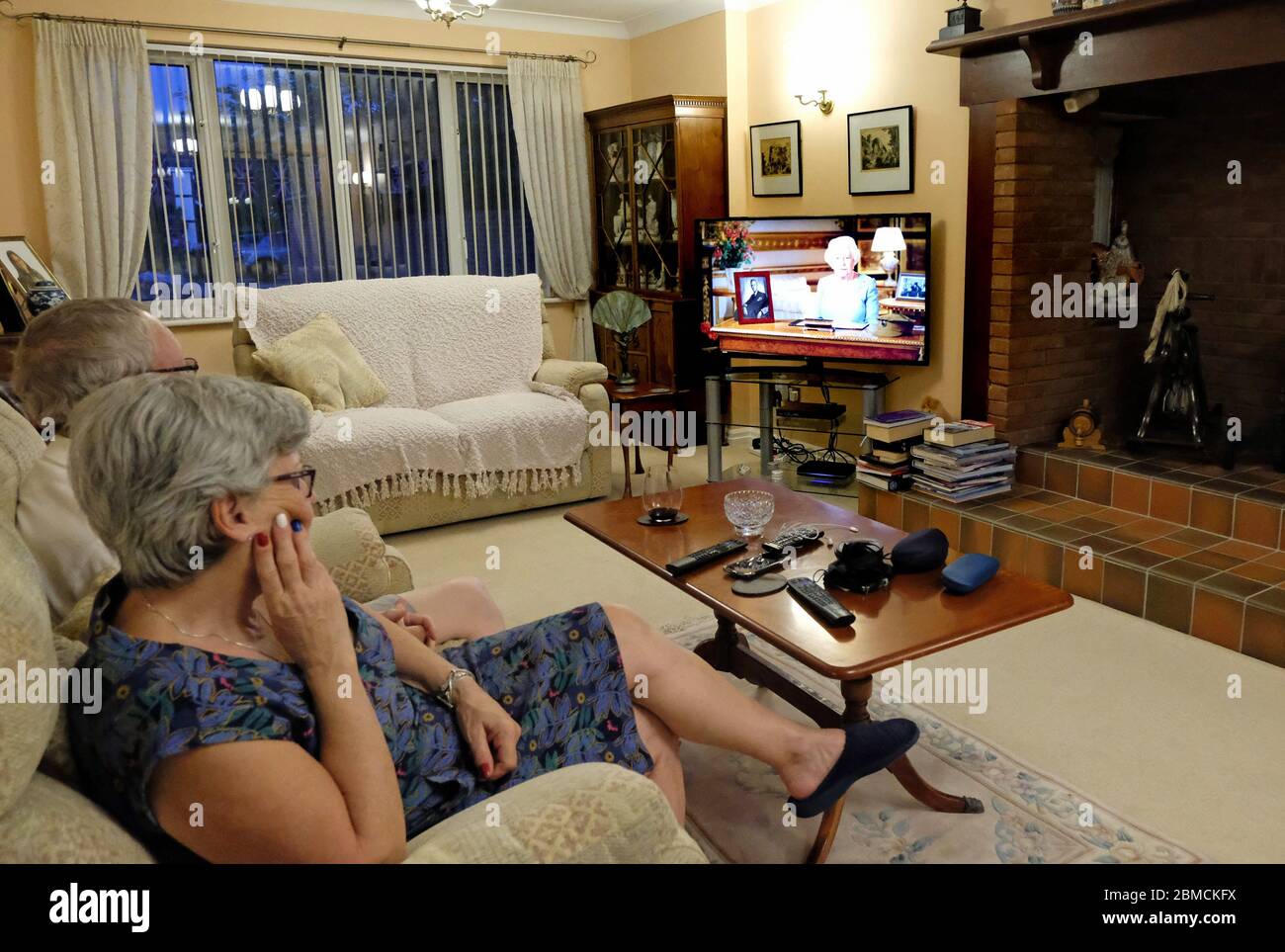 Steve Hogan, 72, and Caroline Hogan, 65, watch a pre-recorded speech by ...
