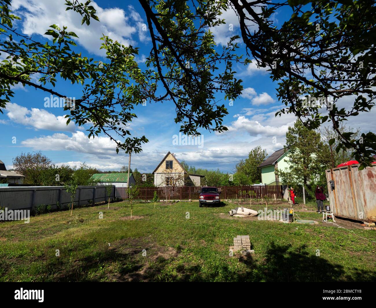 View of a garden suburban plot where city residents grow fruits and ...