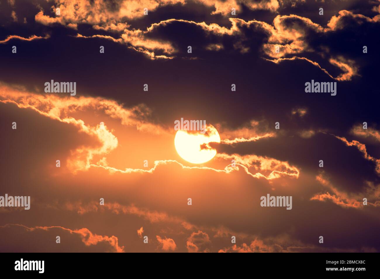 Golden hour of sunset at red sea shore with dramatic sky and the golden ...