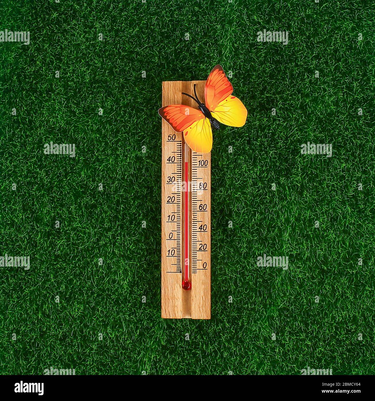 Thermometer displaying high 40 degree hot temperatures in sun summer ...