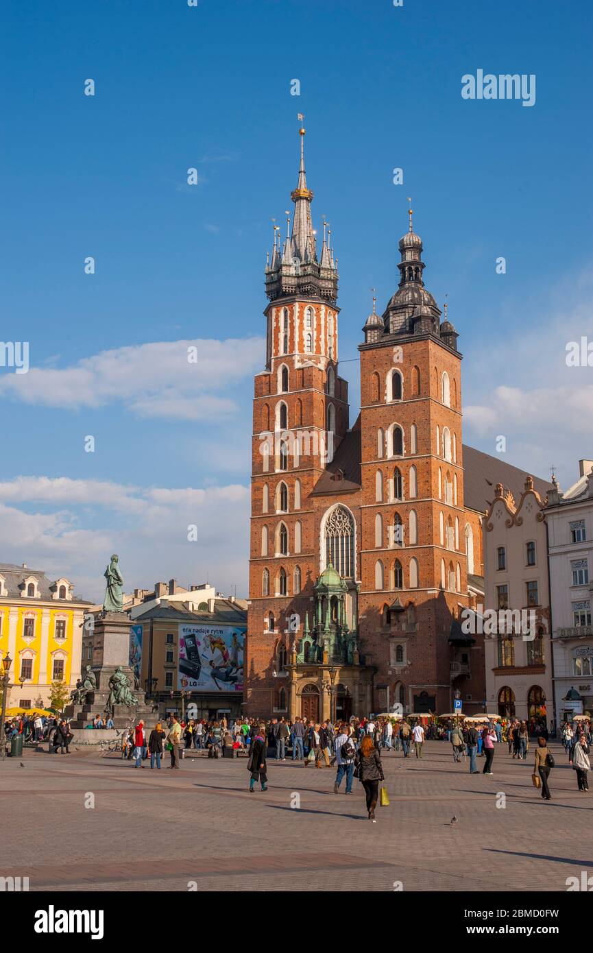 The market square (Rynek Glowny) with the 14th-century Gothic basilica ...