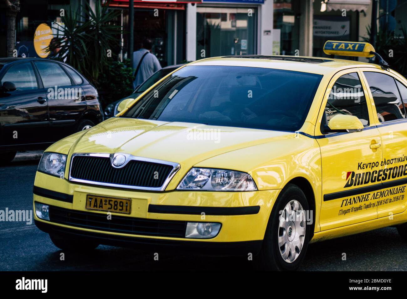 Athens Greece September 4, 2019 View of Greek yellow taxi driving ...