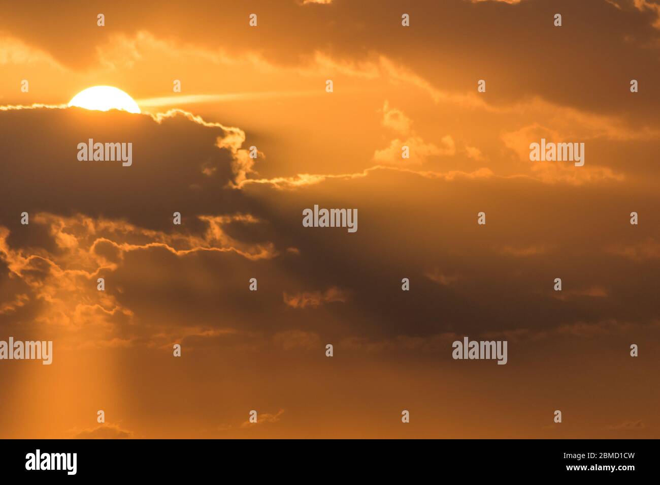 Golden hour of sunset at red sea shore with dramatic sky and the golden ...