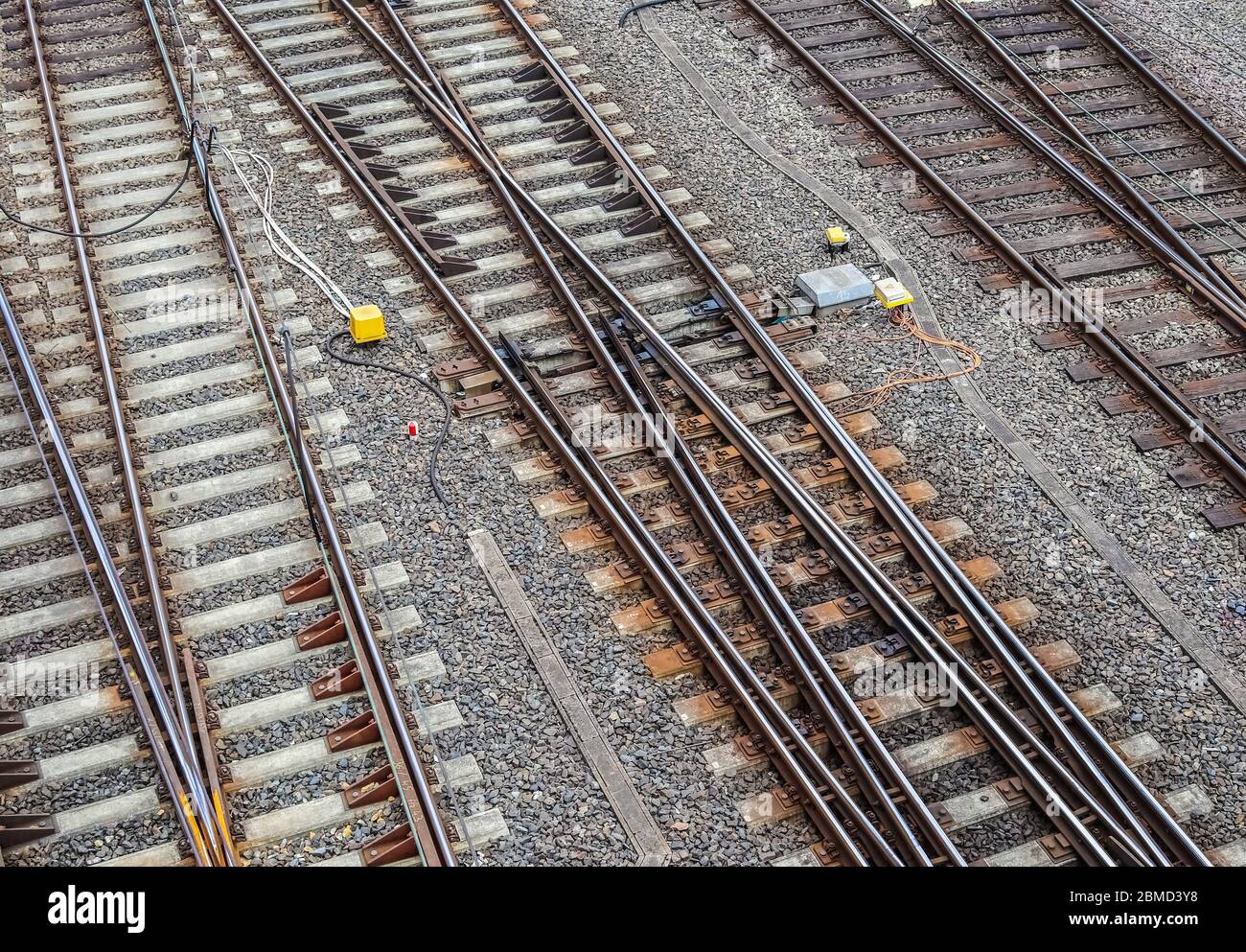 Multiple railroad tracks with junctions at a railway station in a ...
