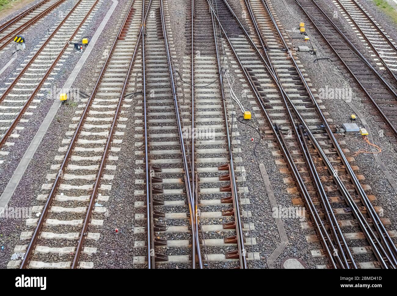 Multiple railroad tracks with junctions at a railway station in a ...