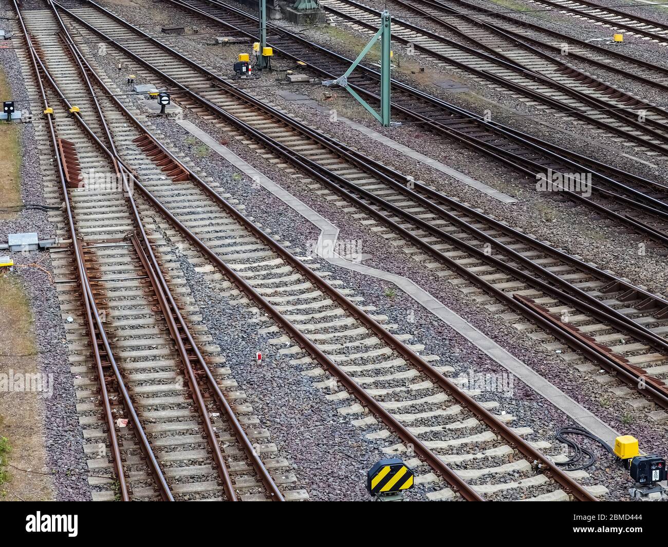 Multiple railroad tracks with junctions at a railway station in a ...