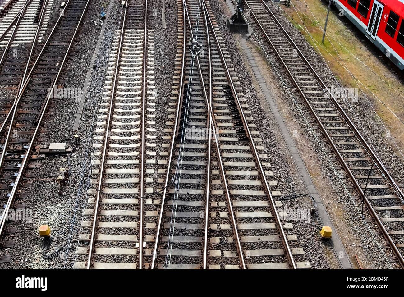 Multiple railroad tracks with junctions at a railway station in a ...