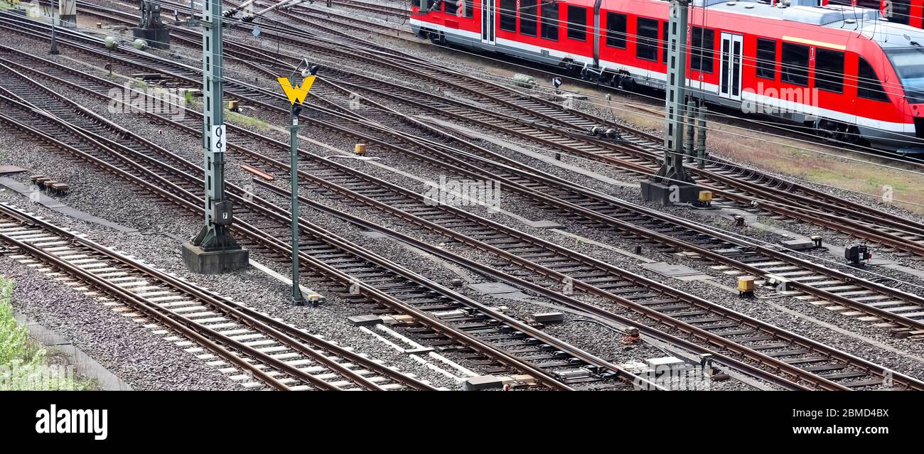 Multiple railroad tracks with junctions at a railway station in a ...