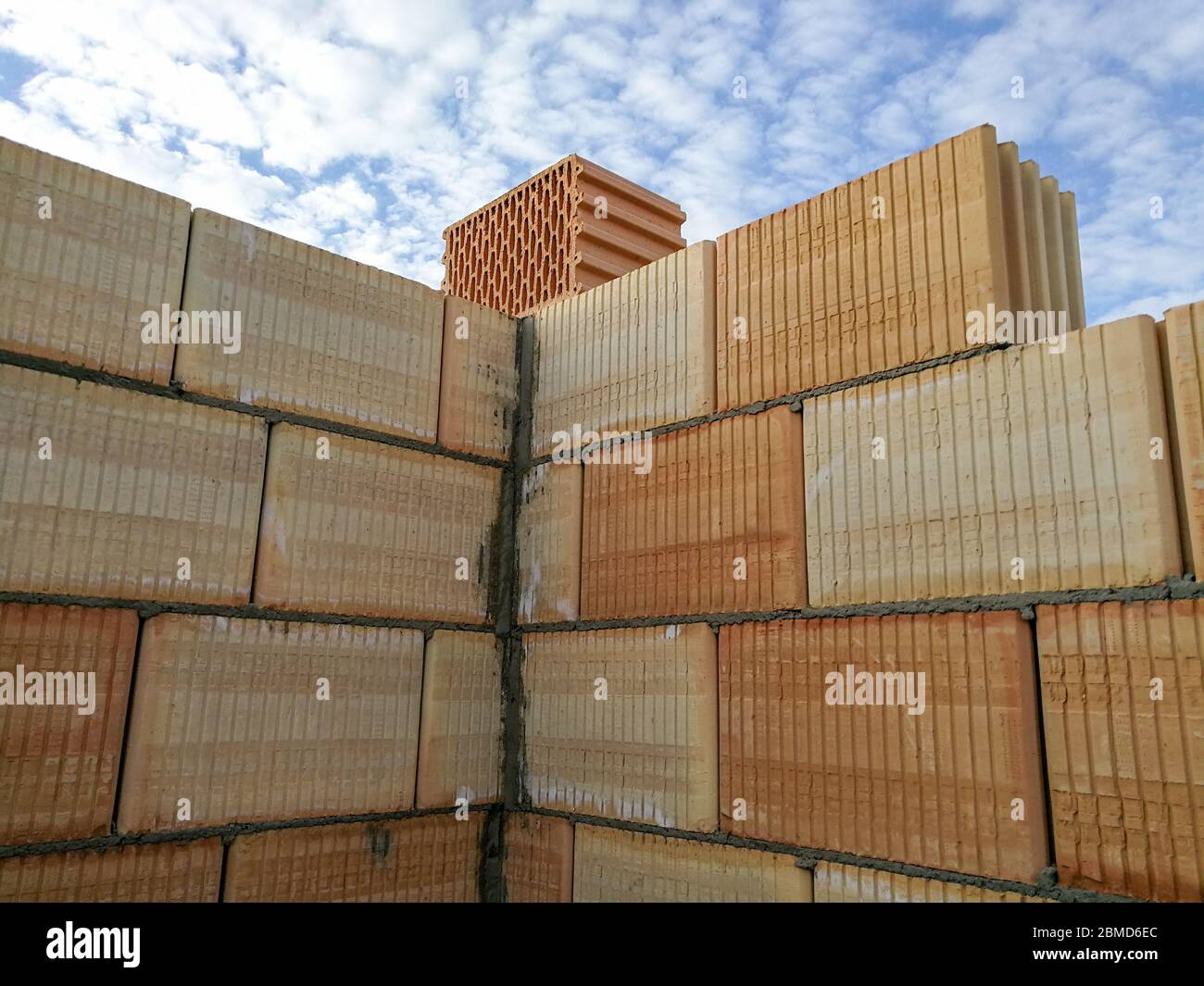 House wall under construction build from ceramic blocks in construction ...