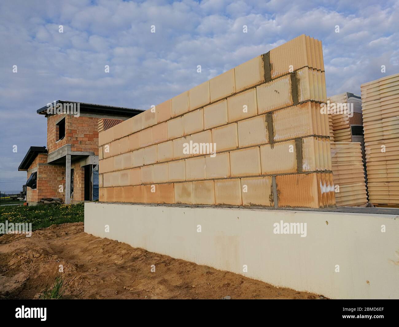House wall under construction build from ceramic blocks in construction ...